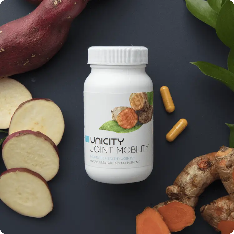 Bottle of Joint Mobility next to capsules