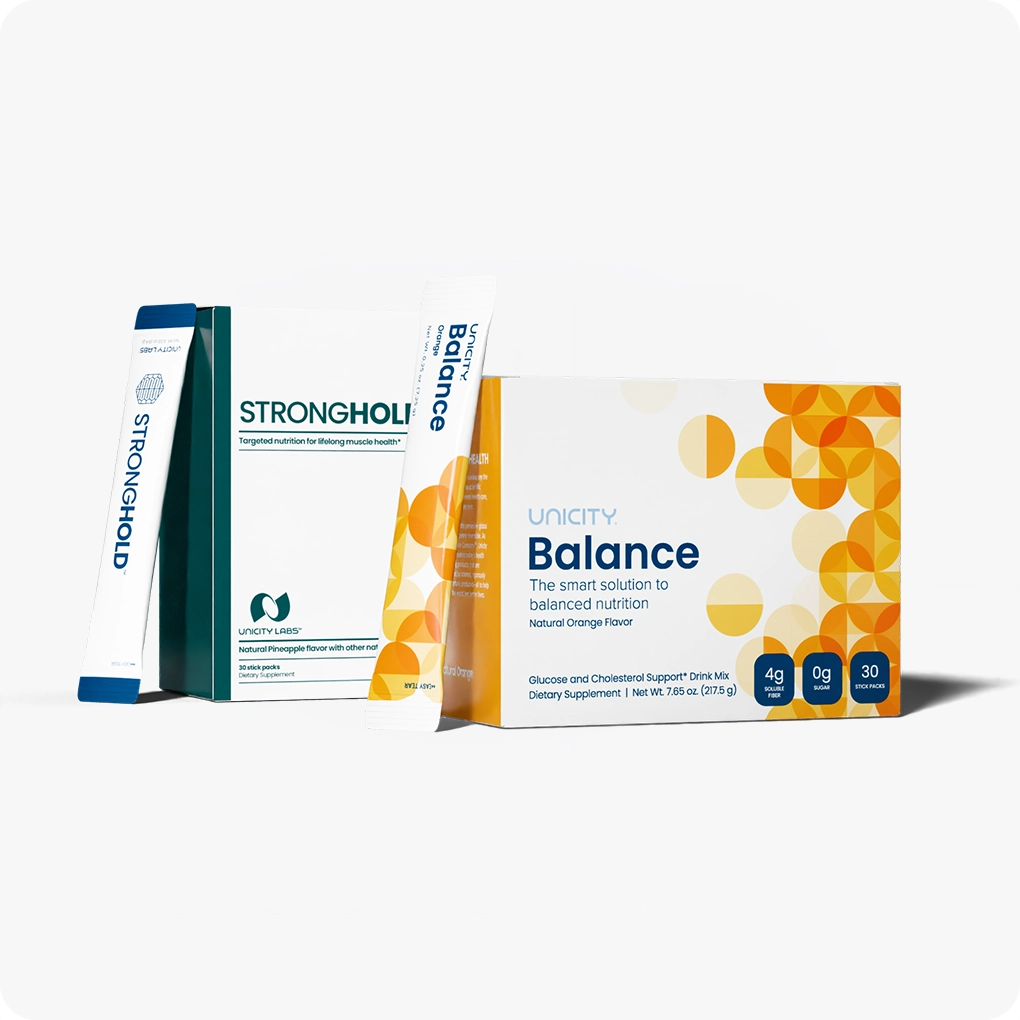 Unicity Balance Orange and STRONGHOLD boxes with stick packs beside ...
