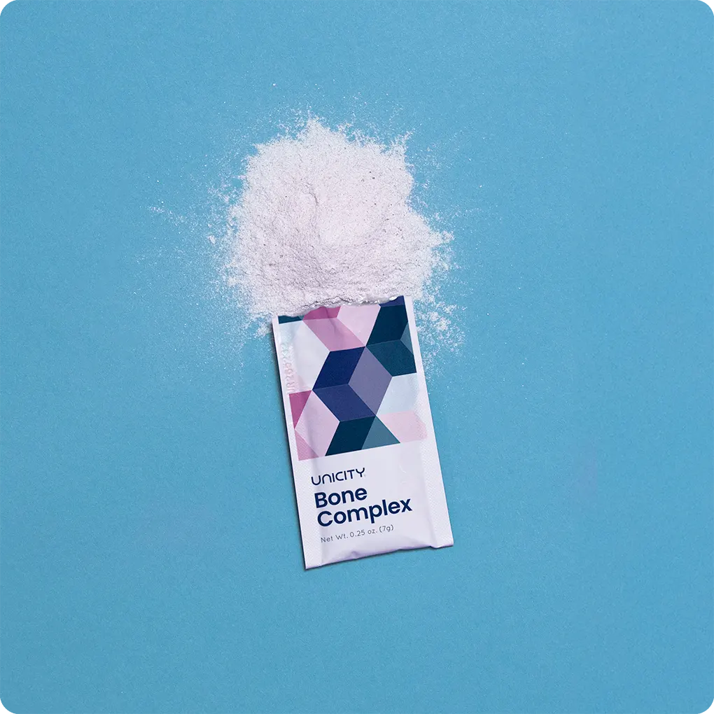 Sachet abierto de Bone Complex junto al polvo